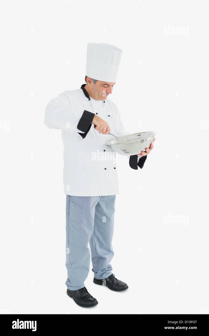 Male chef mixing ingredients using whisk Stock Photo - Alamy
