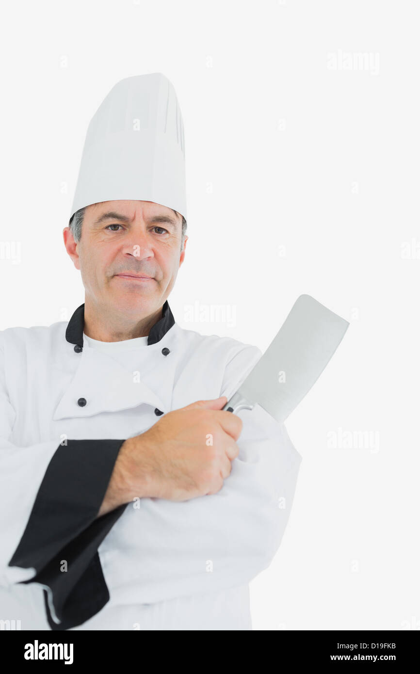 Male chef holding cleaver Stock Photo - Alamy