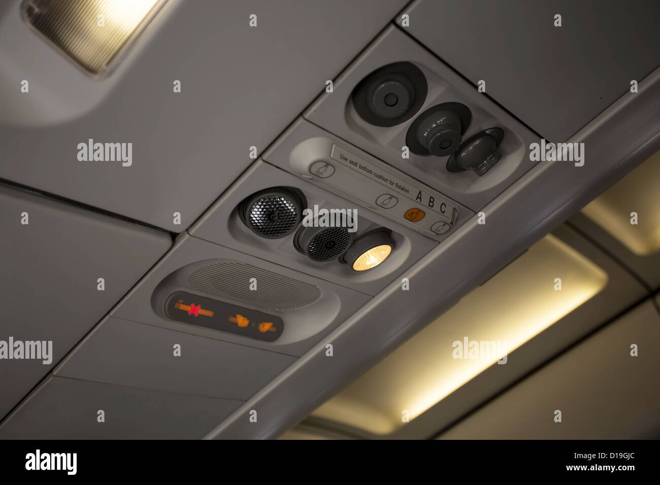 Airline passenger overhead cabin vent and lights Stock Photo - Alamy