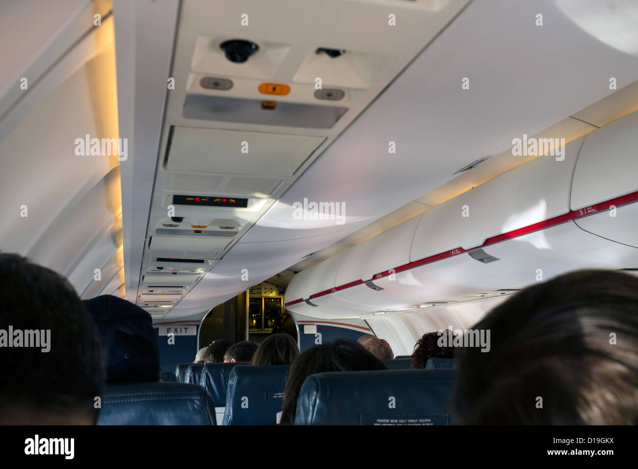Airline passenger cabin in flight, business class Stock Photo - Alamy