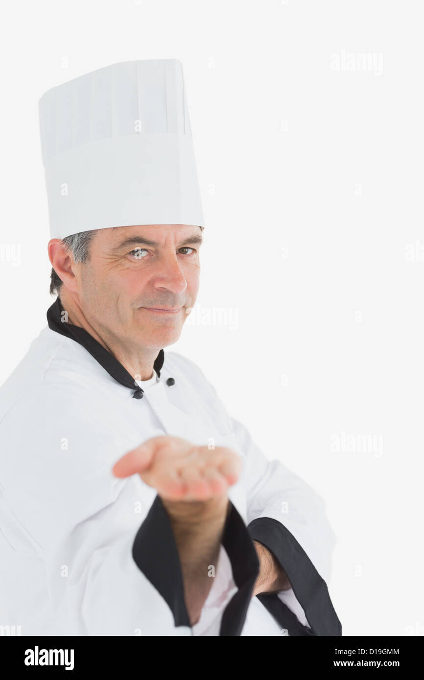 Male chef presenting an invisible product Stock Photo - Alamy