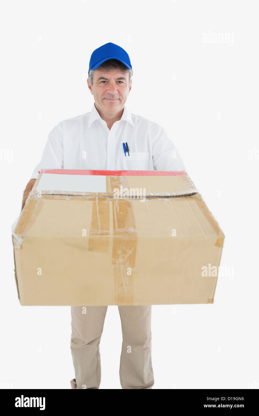 Courier man with cardboard box Stock Photo - Alamy