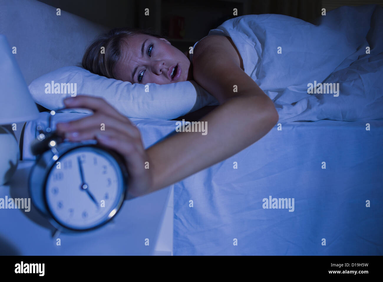 Tired adult stopping alarm hi-res stock photography and images - Alamy