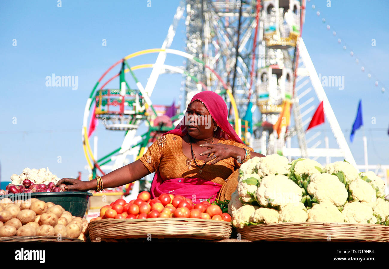 Indian woman selling vegetables at Pushkar camel fair,Rajasthan ,India Stock Photo - Alamy