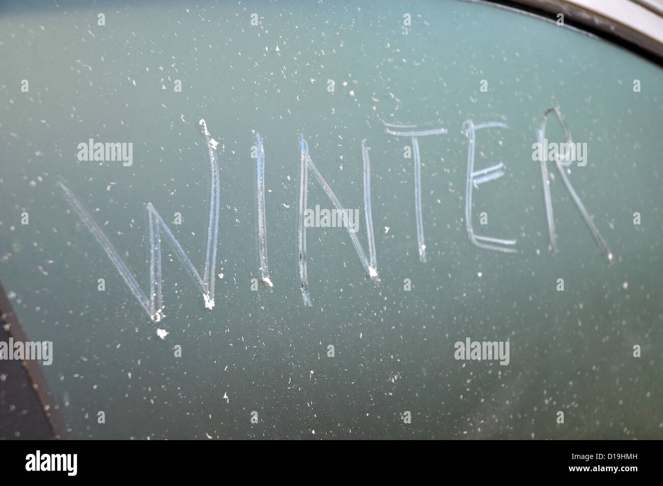 Winter written in the ice on a car window in December Stock Photo - Alamy