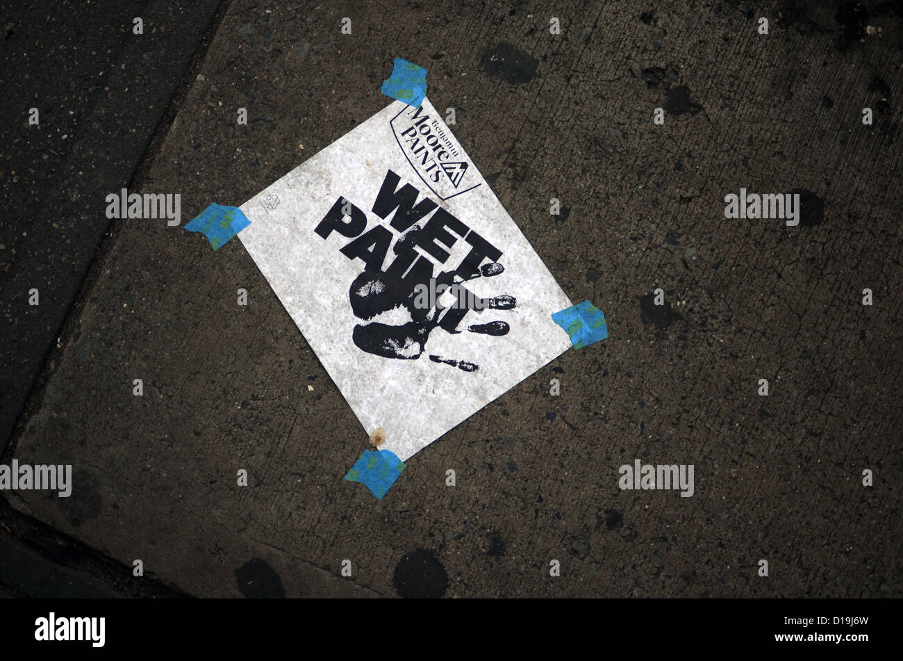 Wet Paint note on floor Stock Photo - Alamy