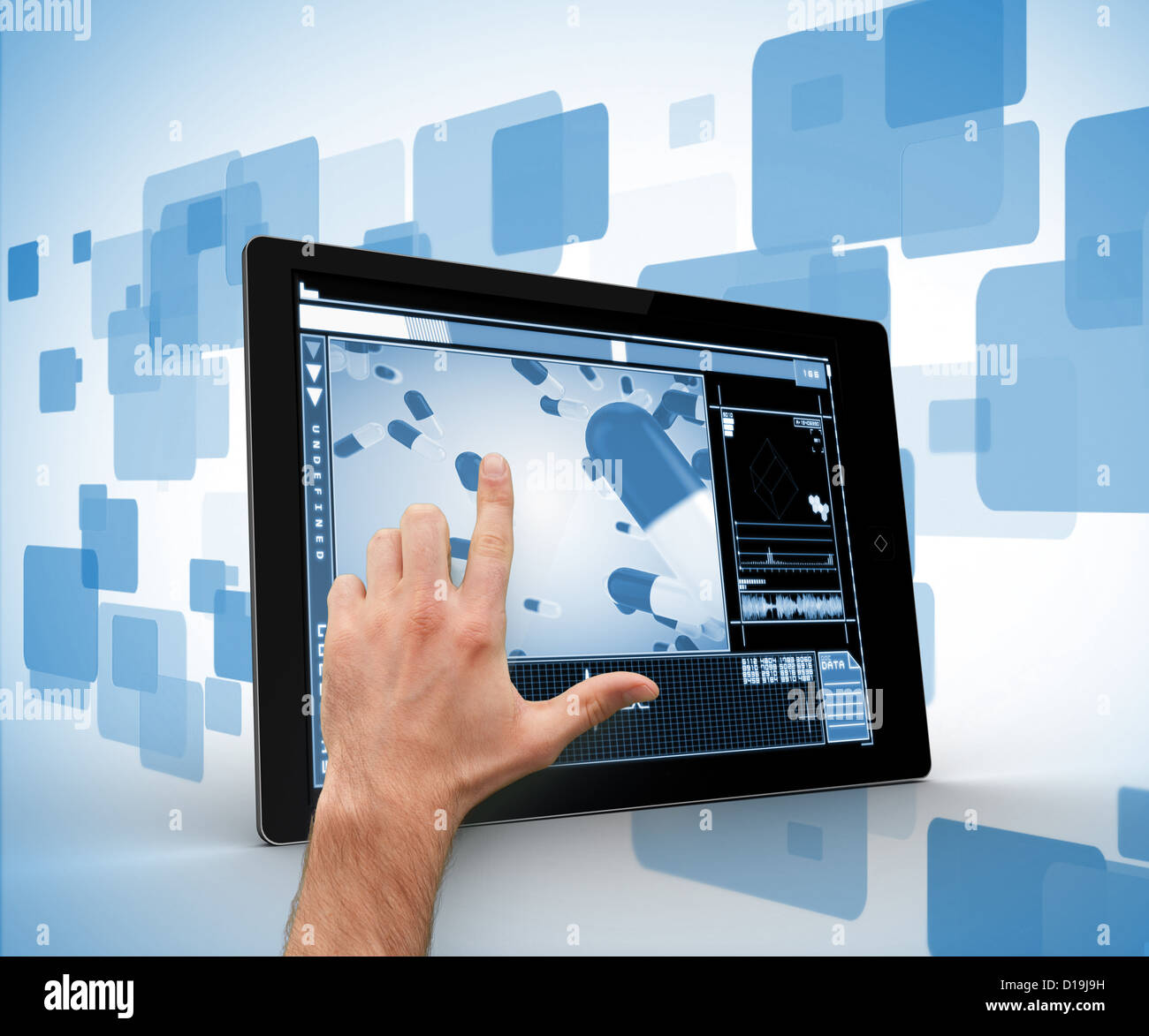 Hand touching a digital tablet Stock Photo - Alamy