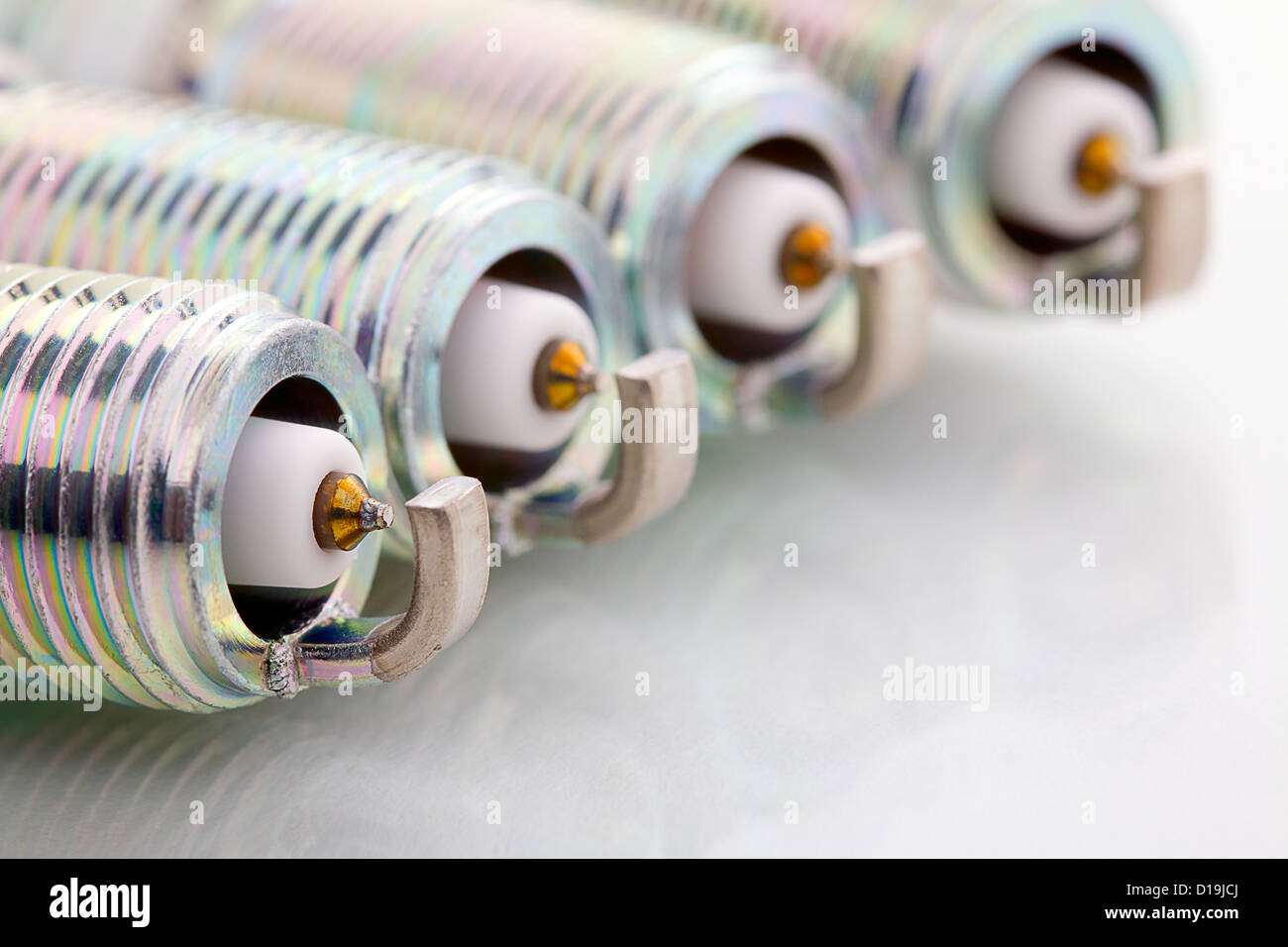 Close up of a spark plug isolated on white background Stock Photo - Alamy