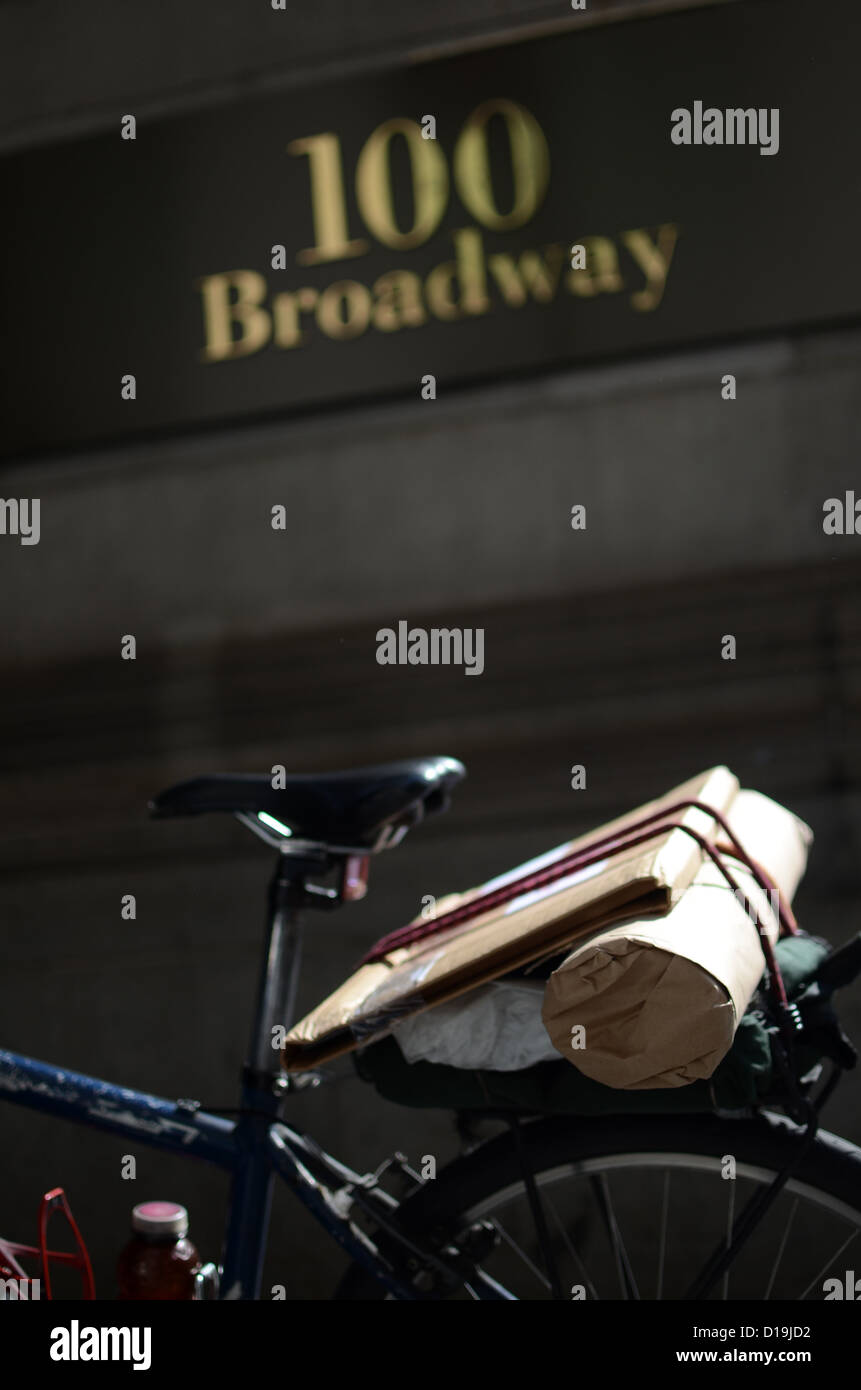 Mail packages on bicycle at 100 Broadway Stock Photo - Alamy