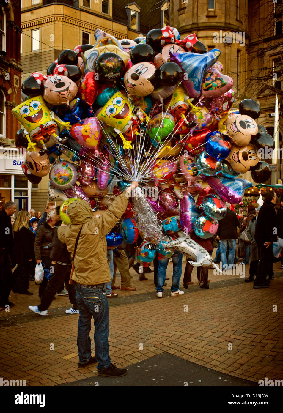 Balloon seller at Christmas market Stock Photo - Alamy