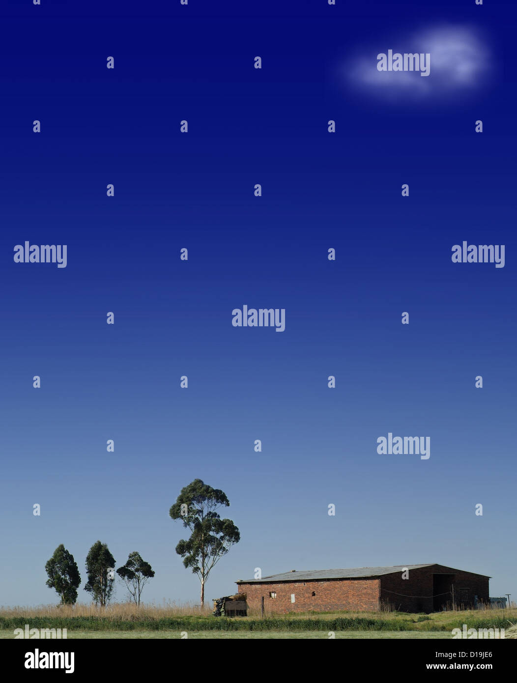 Colour farm scene with trees and blue sky Stock Photo - Alamy