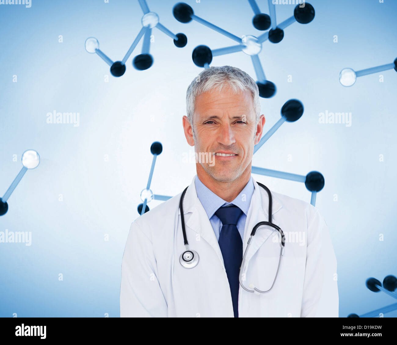 Smiling doctor standing with stethoscope on his neck Stock Photo - Alamy