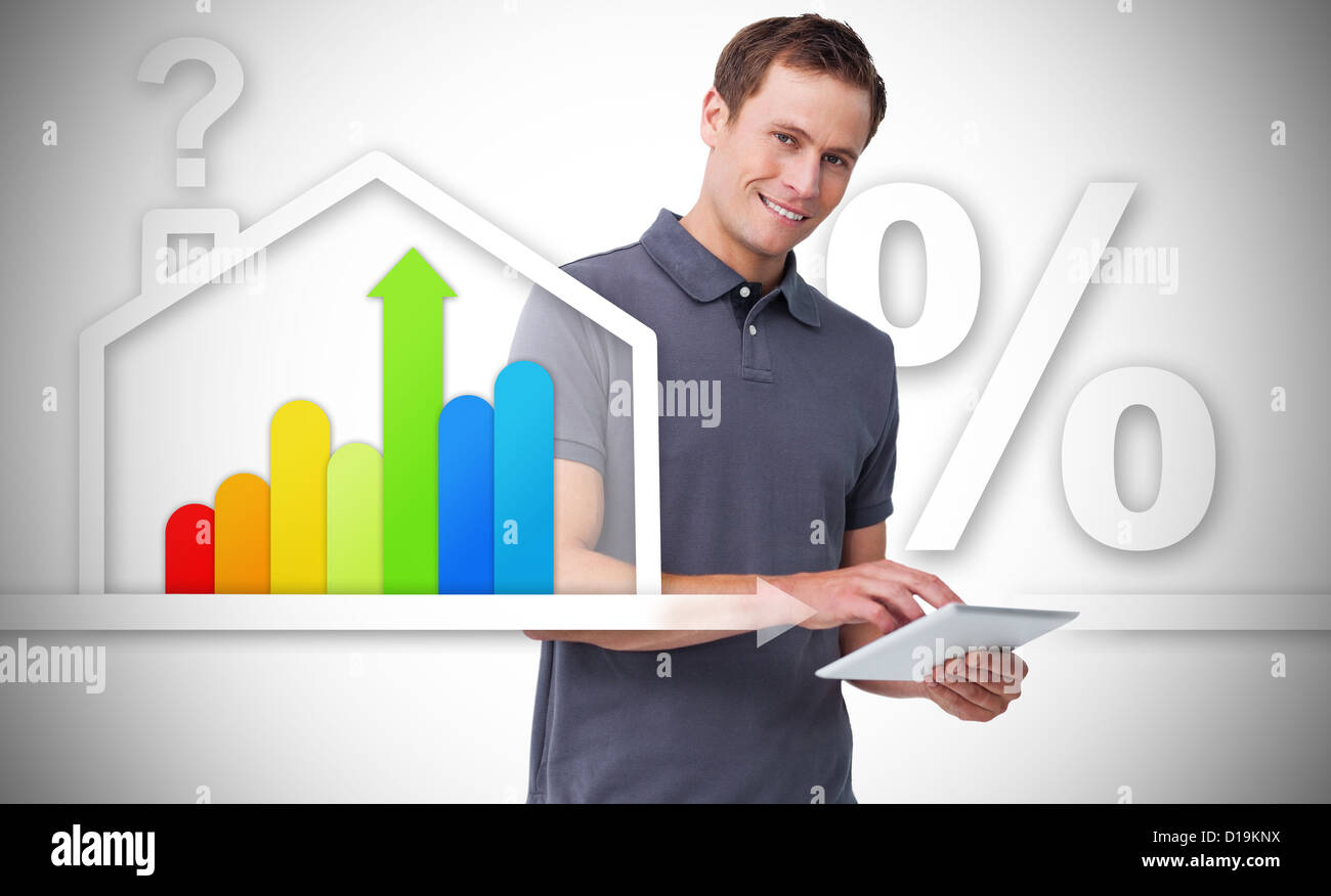 Man standing behind the energy efficient house graphic Stock Photo - Alamy