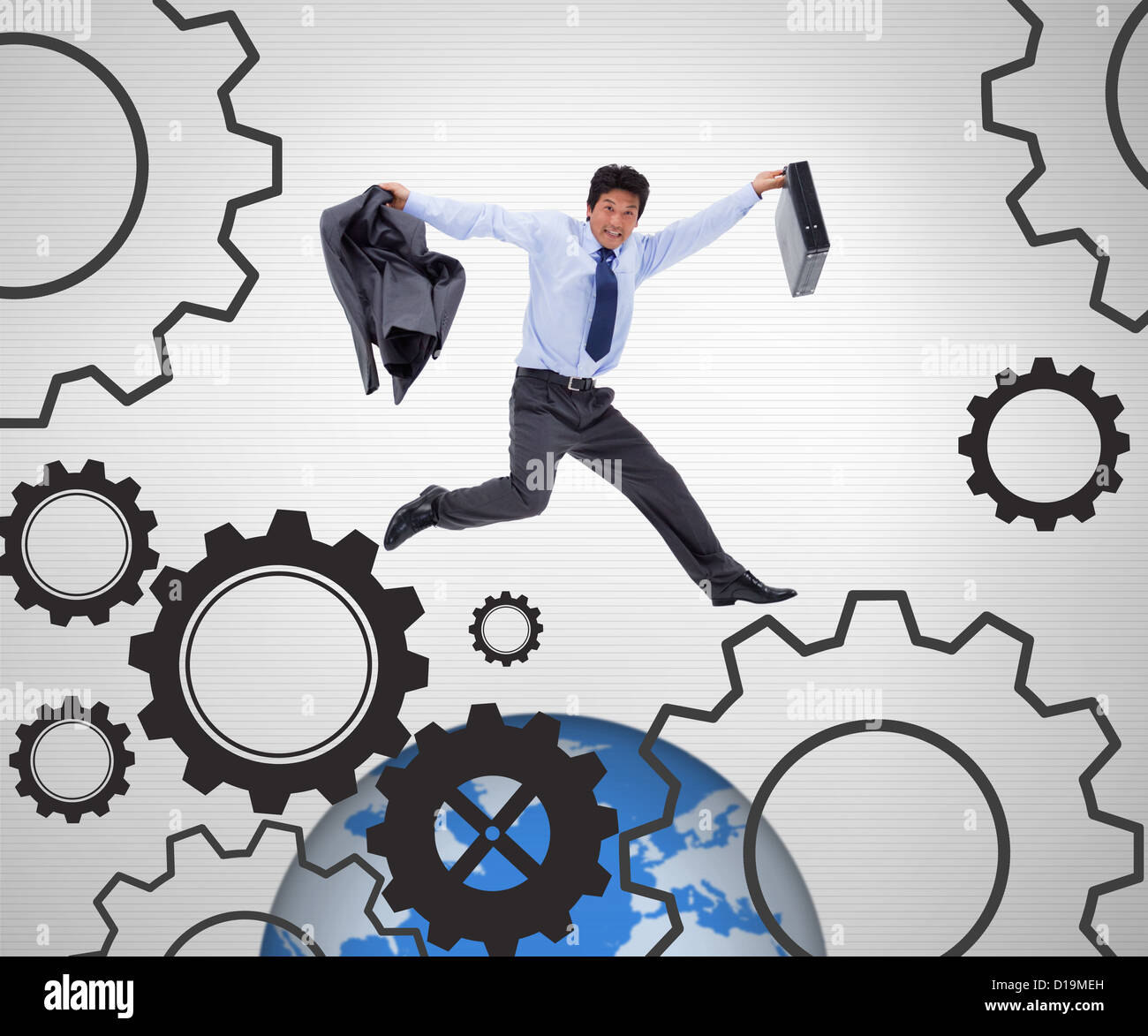 Businessman running against a grey background Stock Photo - Alamy