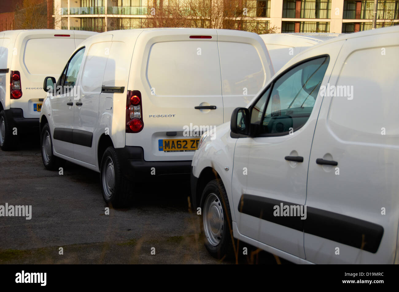 White delivery vans parked hi-res stock photography and images - Alamy