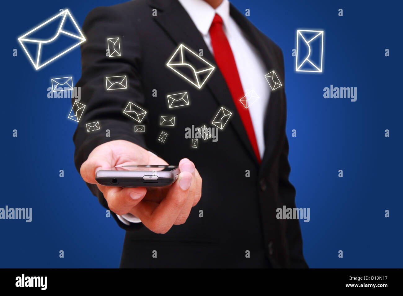 businessman holding smart phone sending message abstract Stock Photo ...