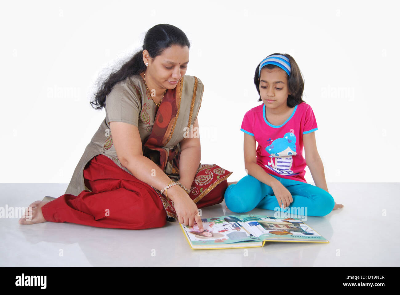 Mother teaching her daughter Stock Photo - Alamy Mother teaching her daughter Stock Photo - Alamy