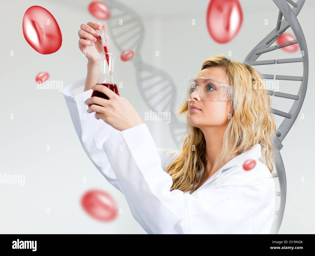 Female scientist examining blood Stock Photo - Alamy