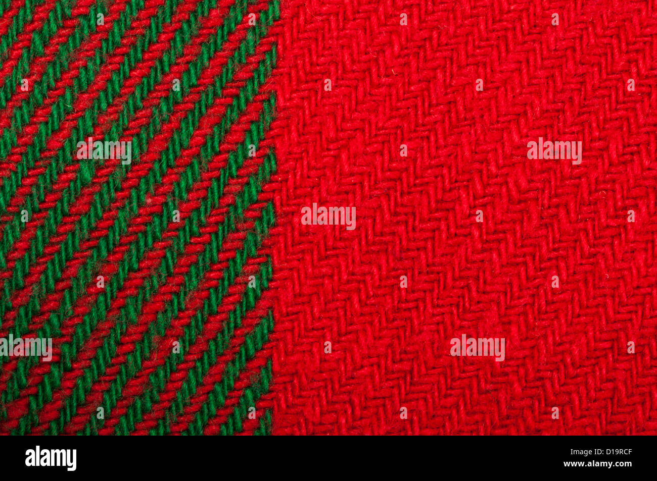 Handmade knit green and red background. Close up structure of the yarn ...
