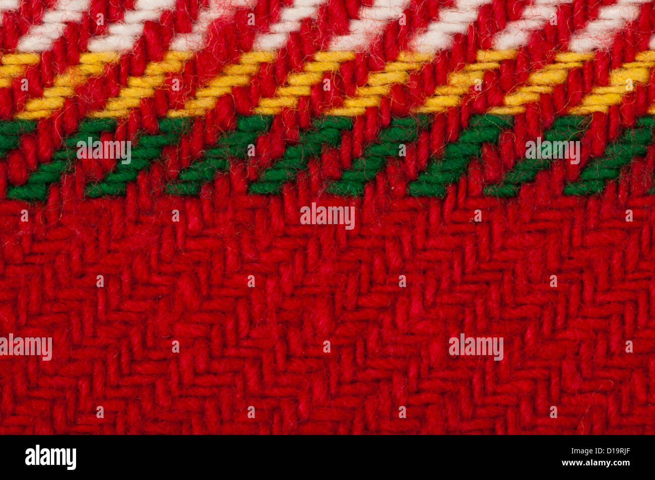 Handmade knit green and red background. Close up structure of the yarn ...