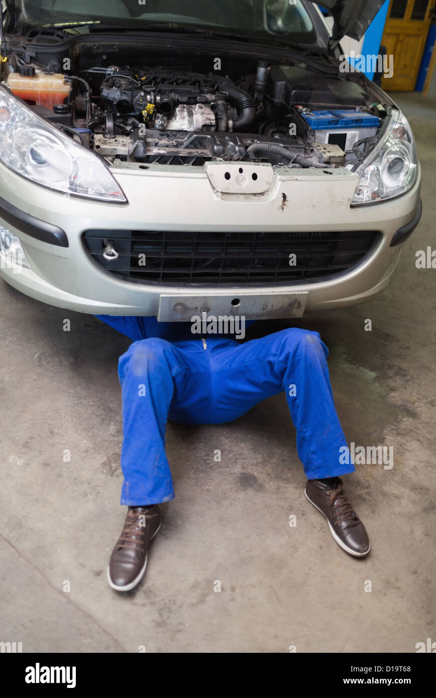 Mechanic under car hi-res stock photography and images - Alamy