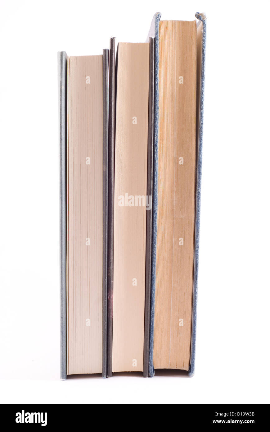 Three books isolated on white. Vertical composition Stock Photo - Alamy