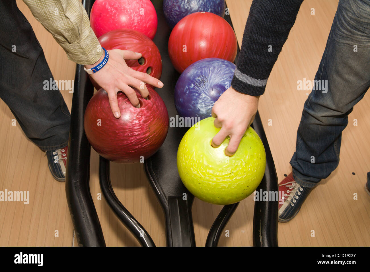 hands of men by bowling Stock Photo - Alamy