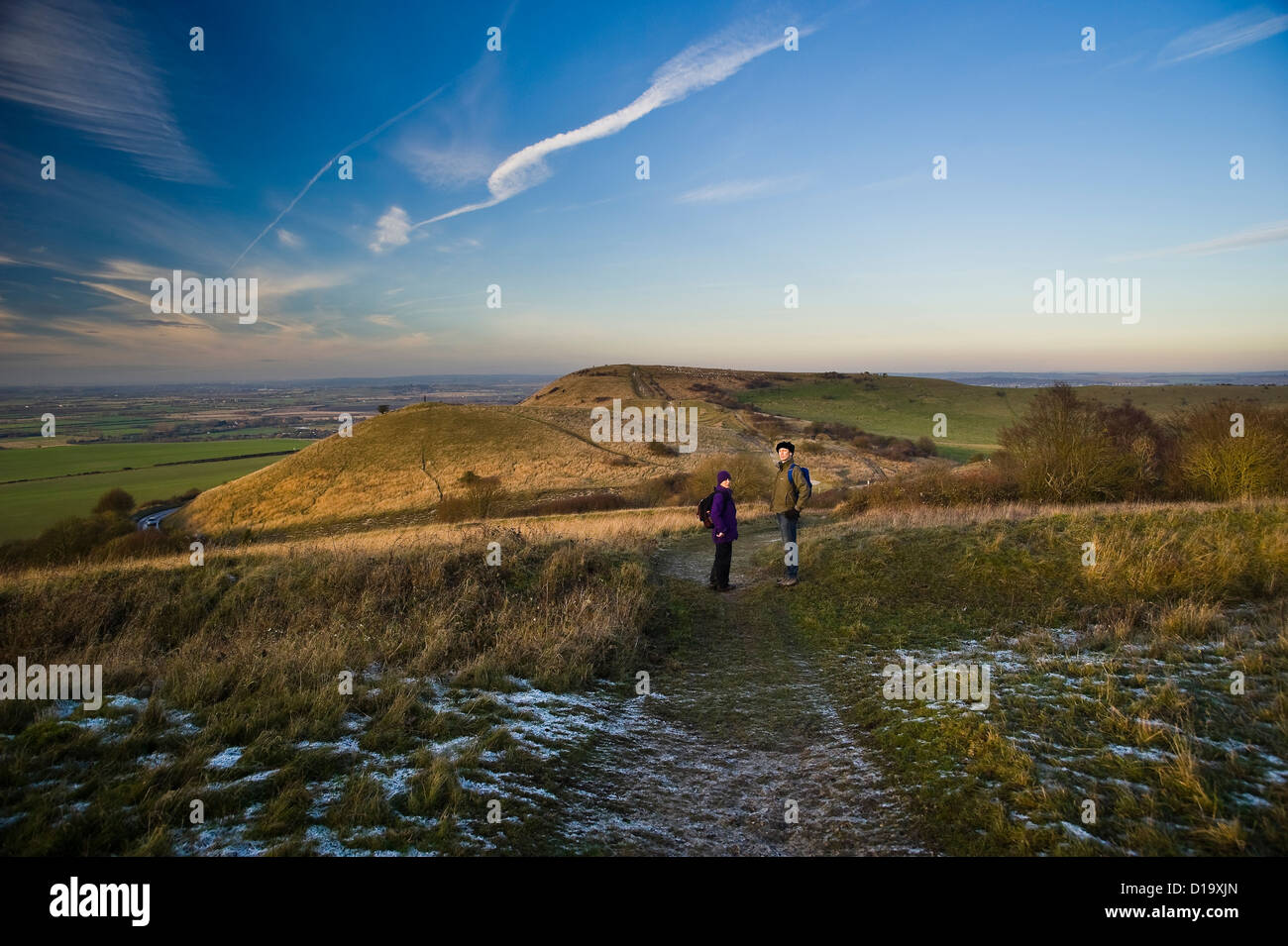 Walkers approaching Ivinghoe Beacon at the end of The Ridgeway National ...