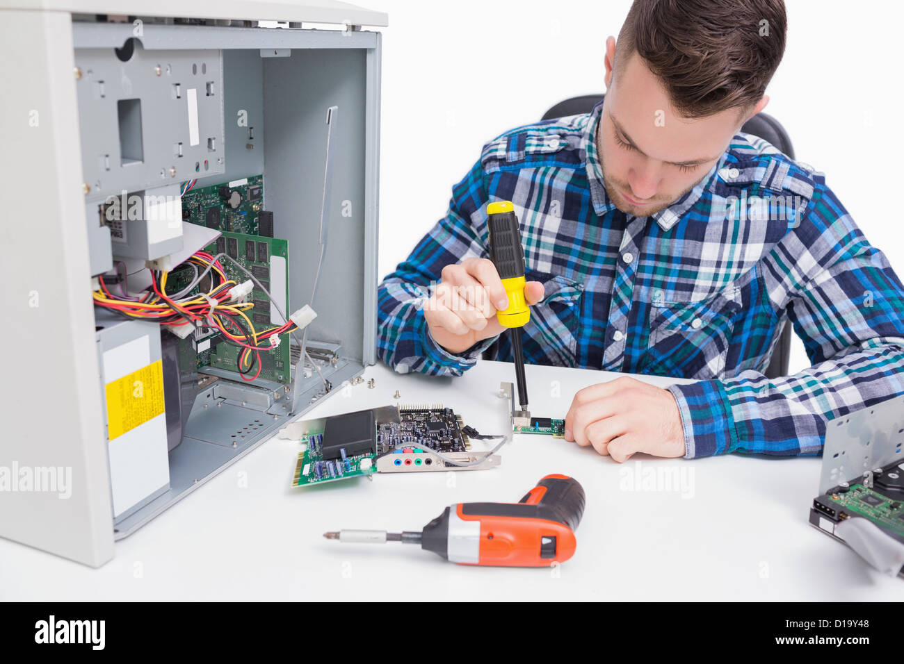 Computer engineer repairing cpu Stock Photo - Alamy