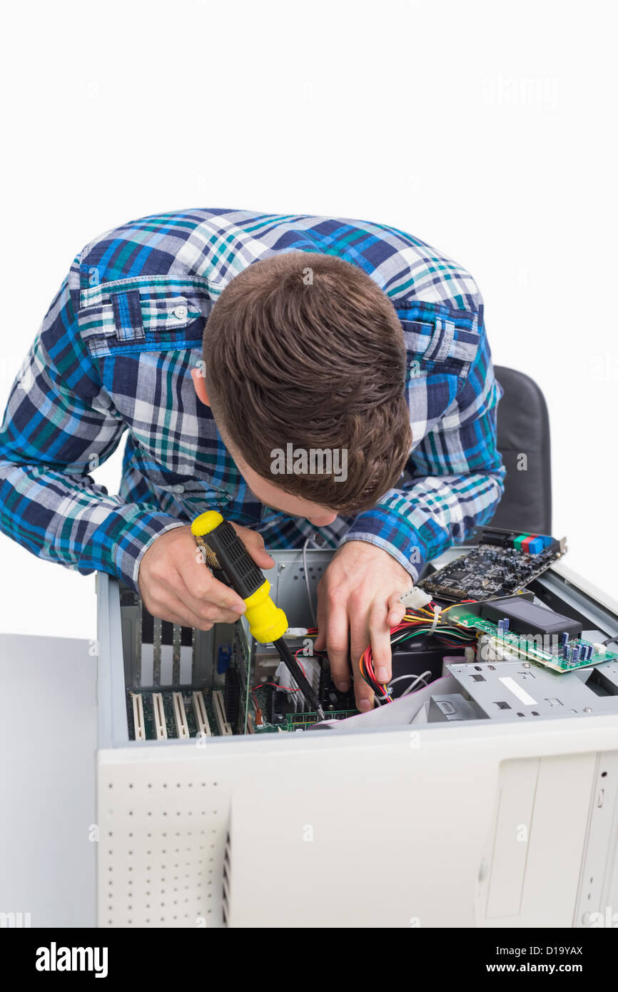 Young it professional repairing cpu Stock Photo - Alamy