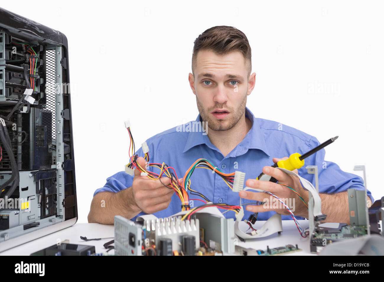 Portrait of young computer engineer working on cpu parts Stock Photo ...