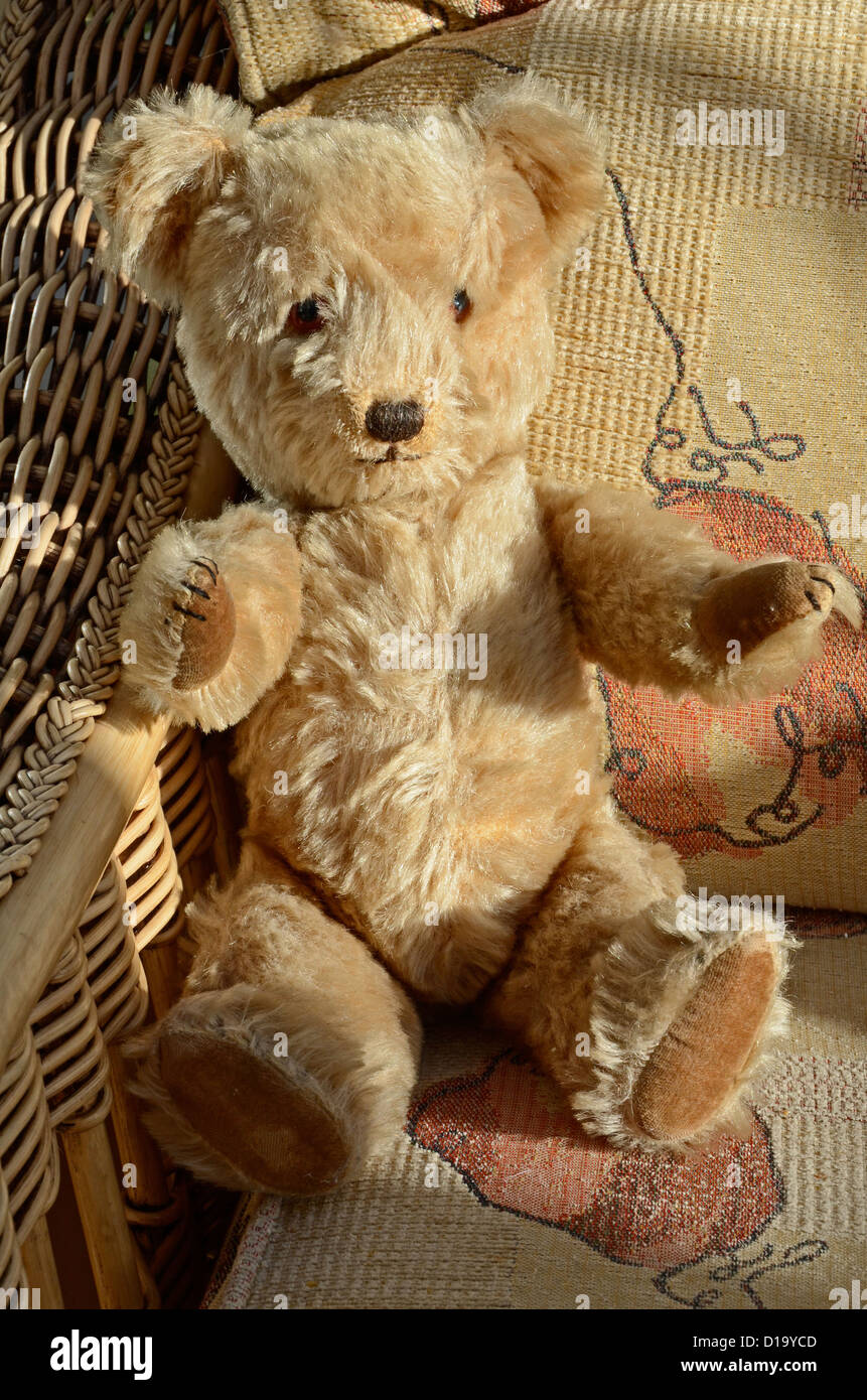 Teddy bear in chair Stock Photo - Alamy