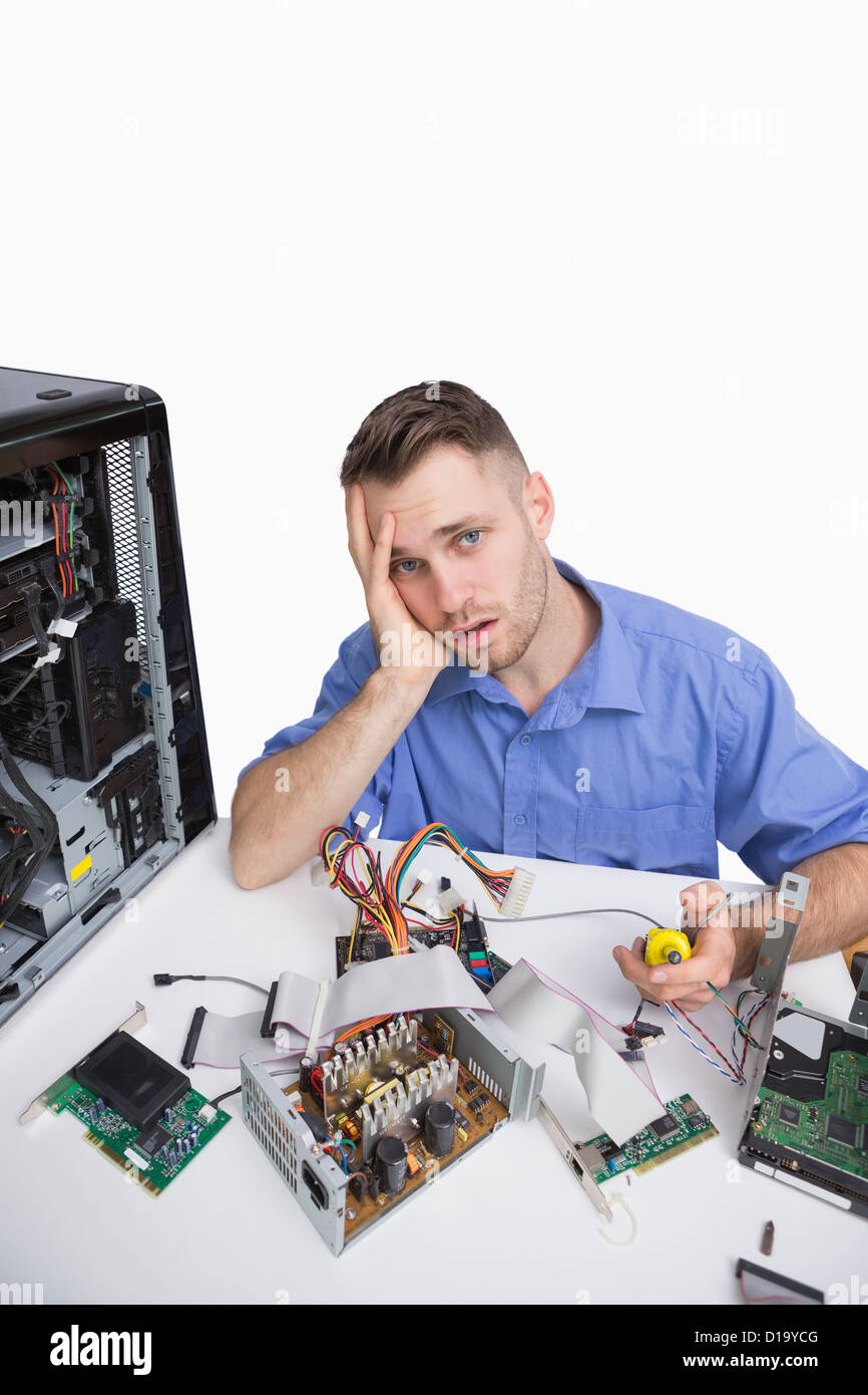 Portrait of tired computer engineer with cpu parts Stock Photo - Alamy
