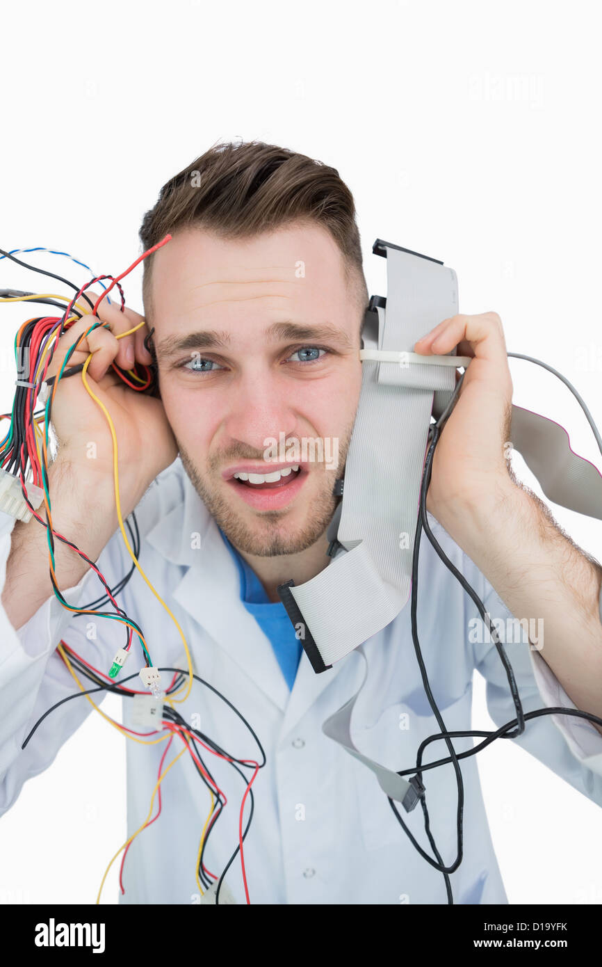Close-up portrait of it professional yelling with cables in hands Stock ...