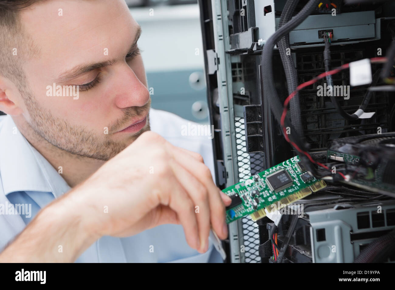 Inserting cpu hi-res stock photography and images - Alamy