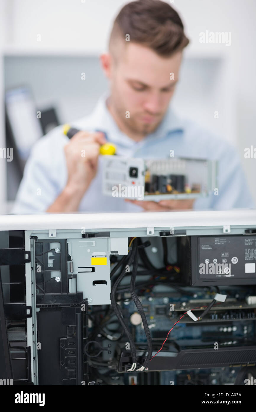 Computer engineer working on cpu part in front of open cpu Stock Photo ...