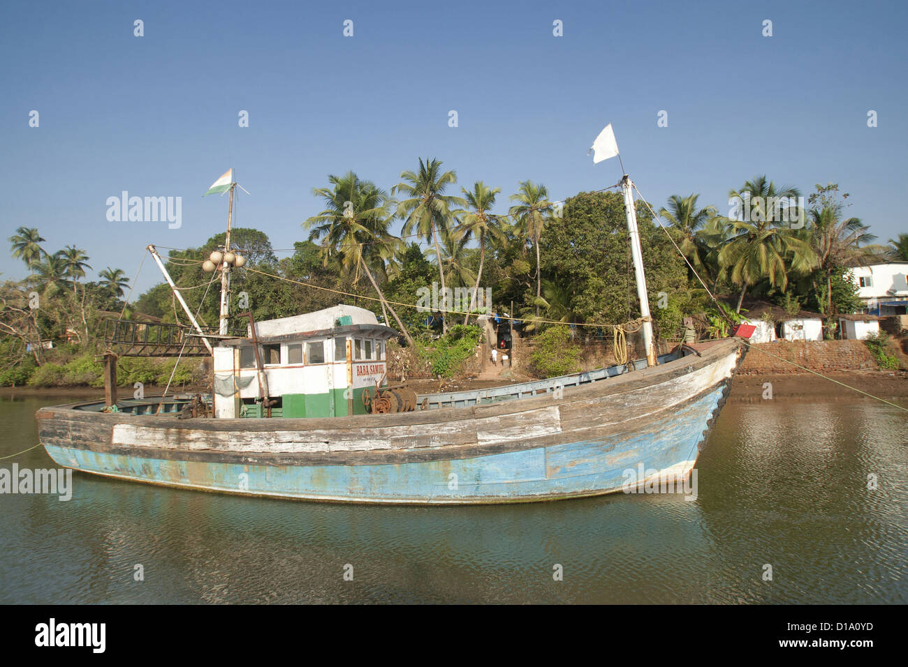 Fishing trawler near Britton backwaters. North Goa, India Stock Photo ...