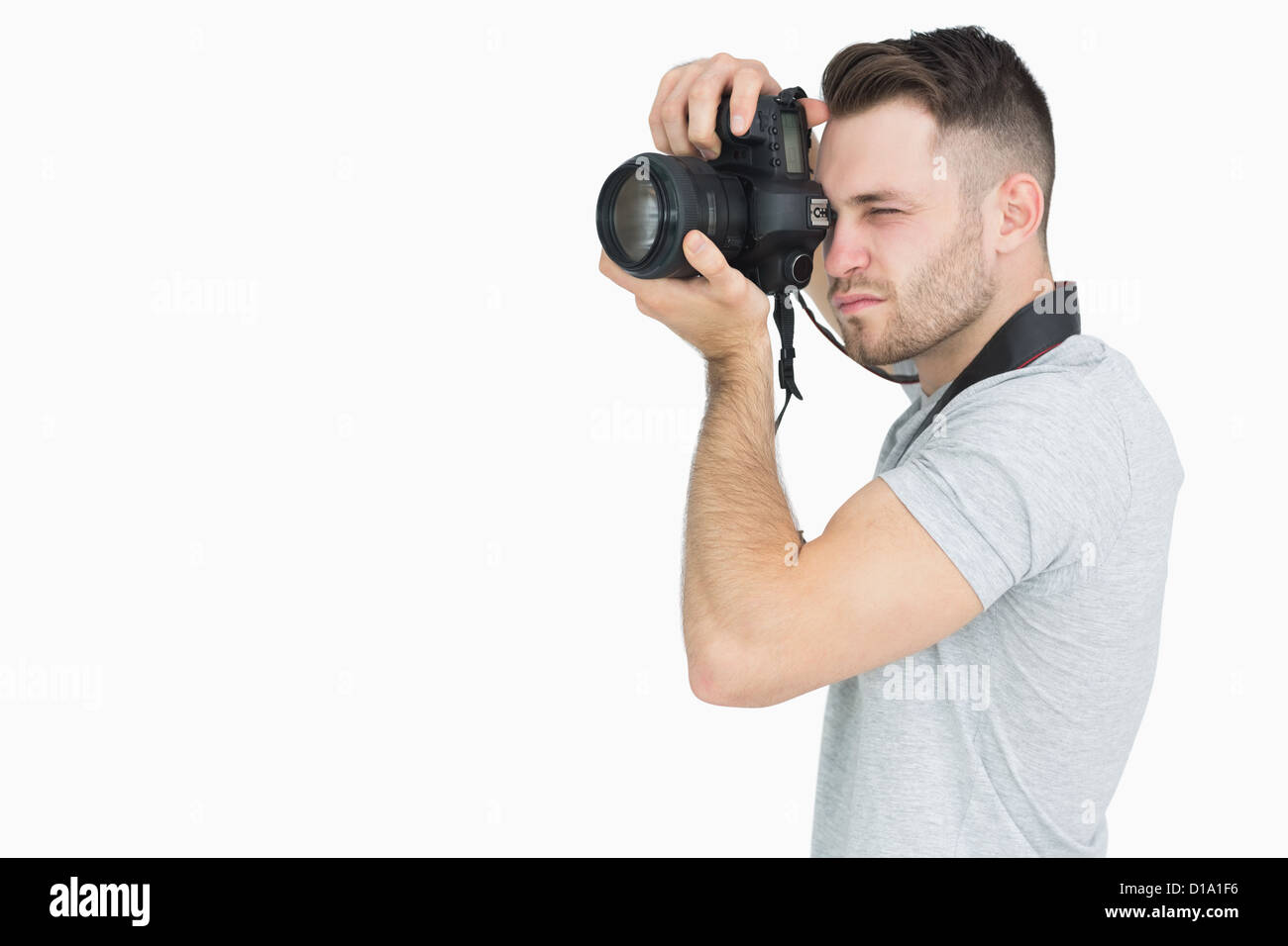 Side view of photographer with photographic camera Stock Photo - Alamy