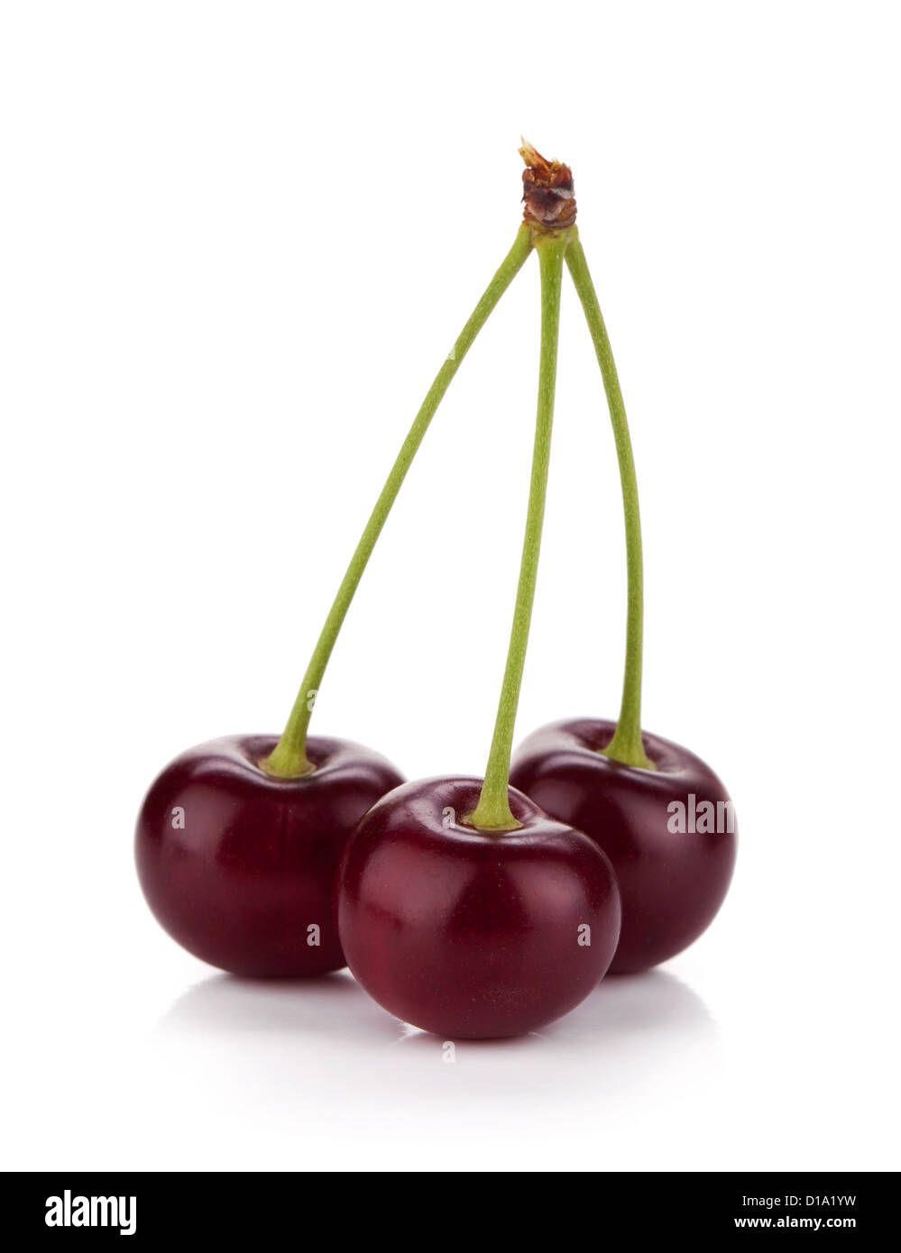 Three ripe cherries. Isolated on white background Stock Photo - Alamy