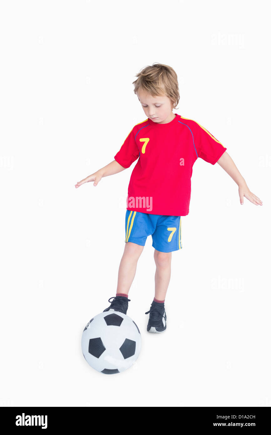 Little boy playing football Stock Photo - Alamy
