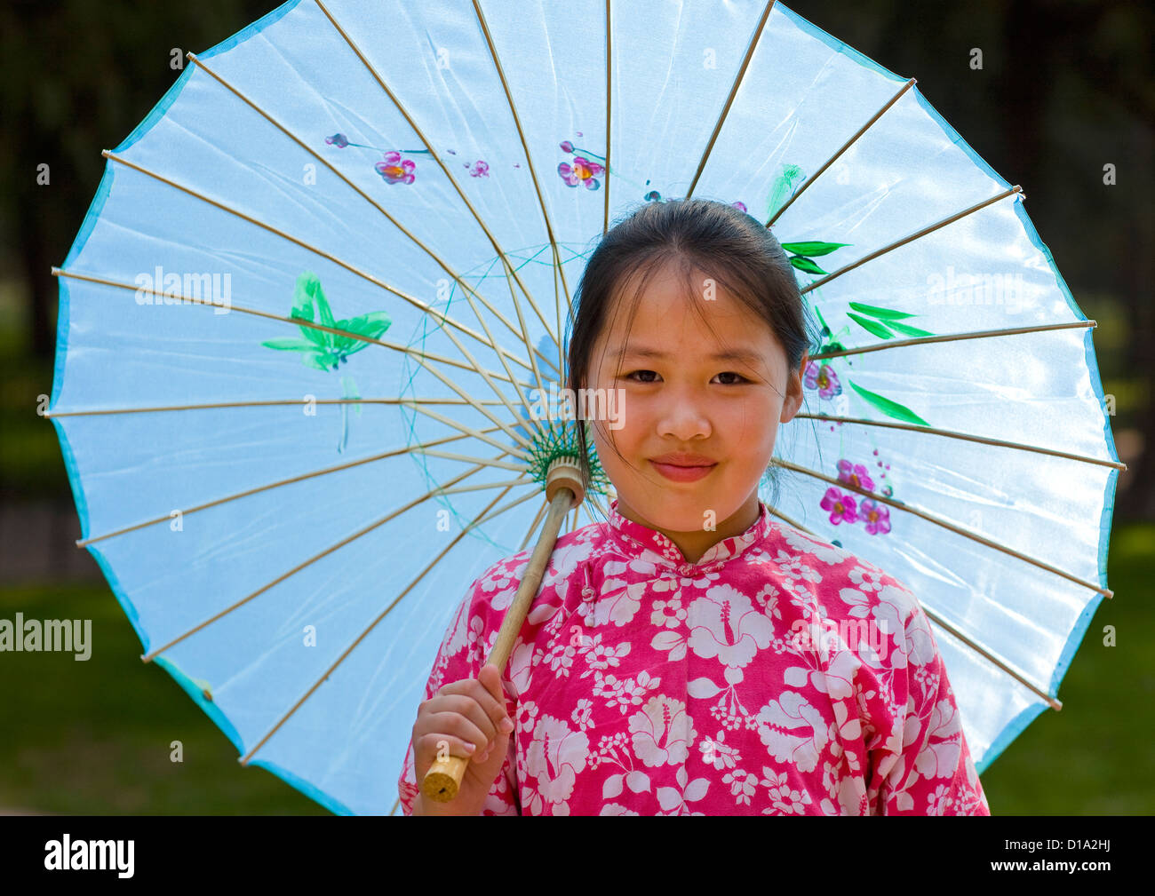 Chinese Girl With An Umbrella, Beijing, China Stock Photo - Alamy