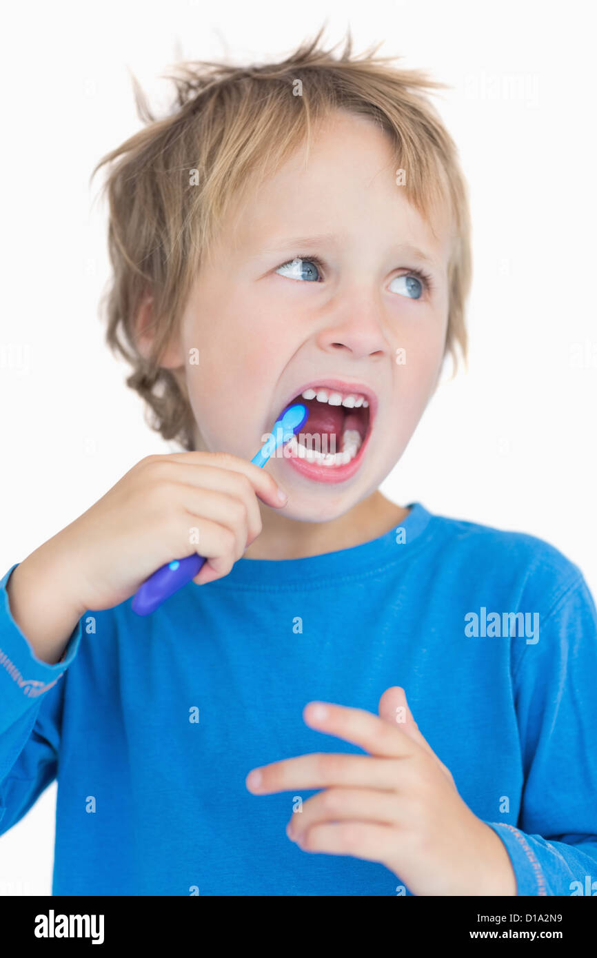 Young boy brushing his teeth Stock Photo - Alamy