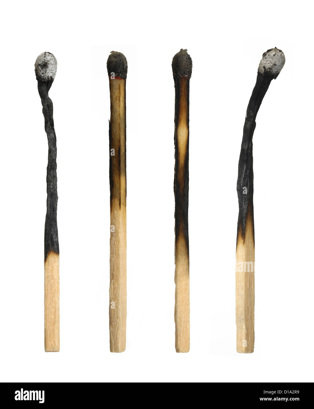 Four half burnt matches shot on white background Stock Photo - Alamy