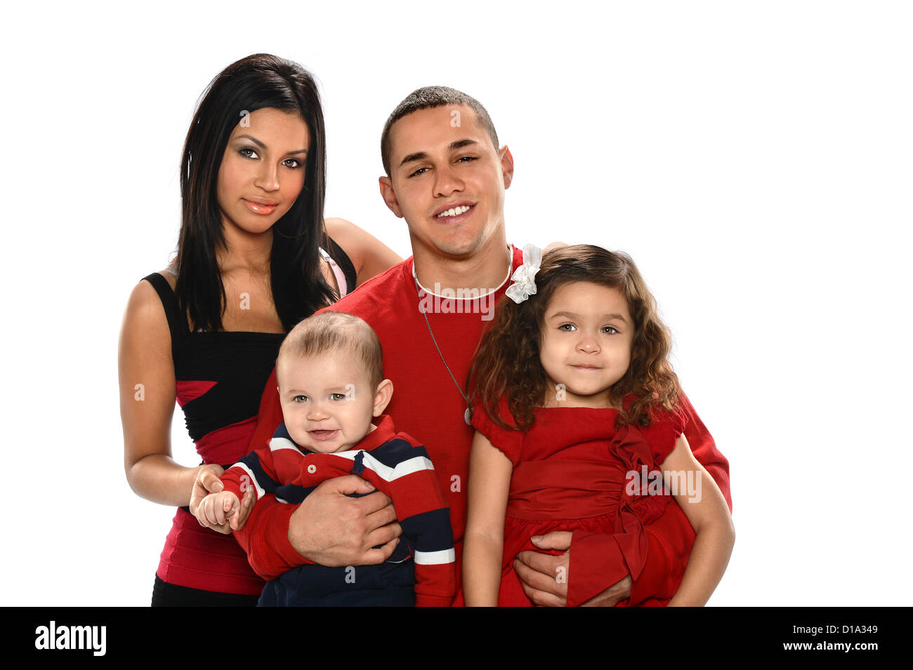 Portrait of Hispanic family with son and daughter isolated over white ...