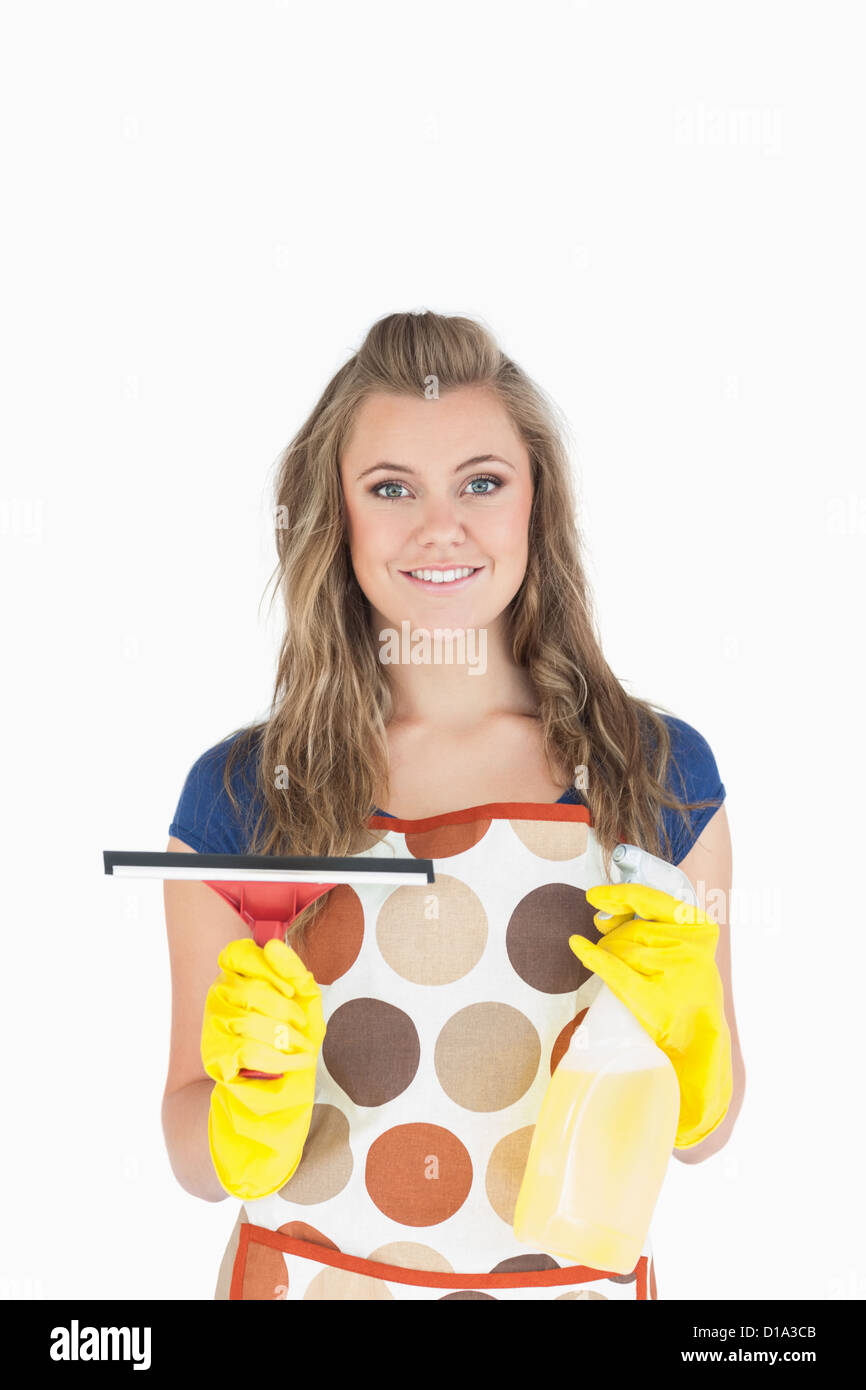 Young maid with wiper and disinfectant spray Stock Photo - Alamy
