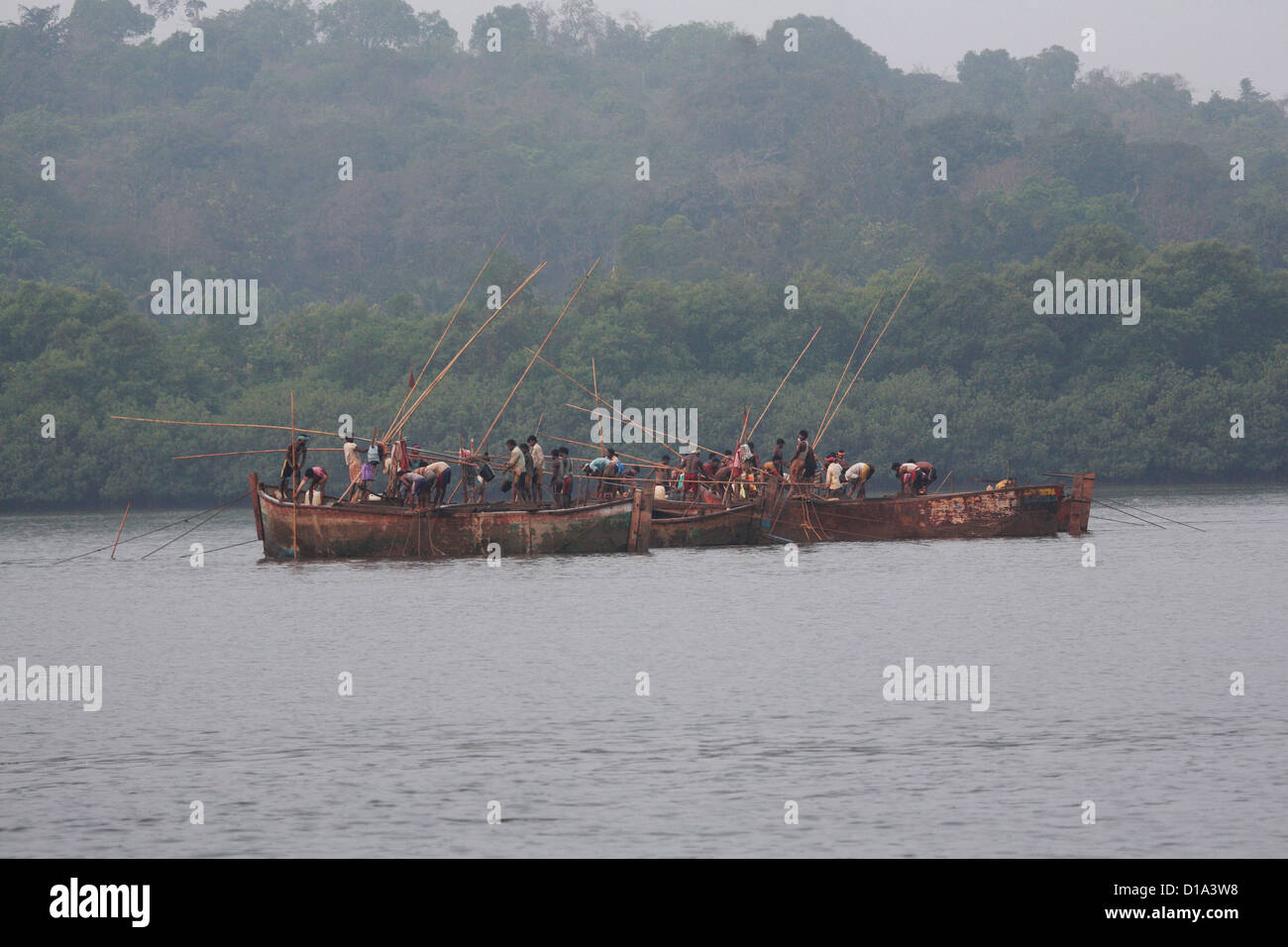 A group of sand mining boats, Goa Stock Photo - Alamy
