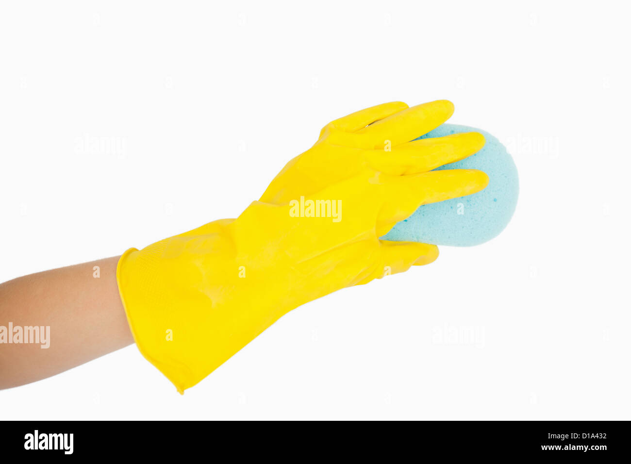 Close-up of yellow gloved hand using sponge Stock Photo - Alamy