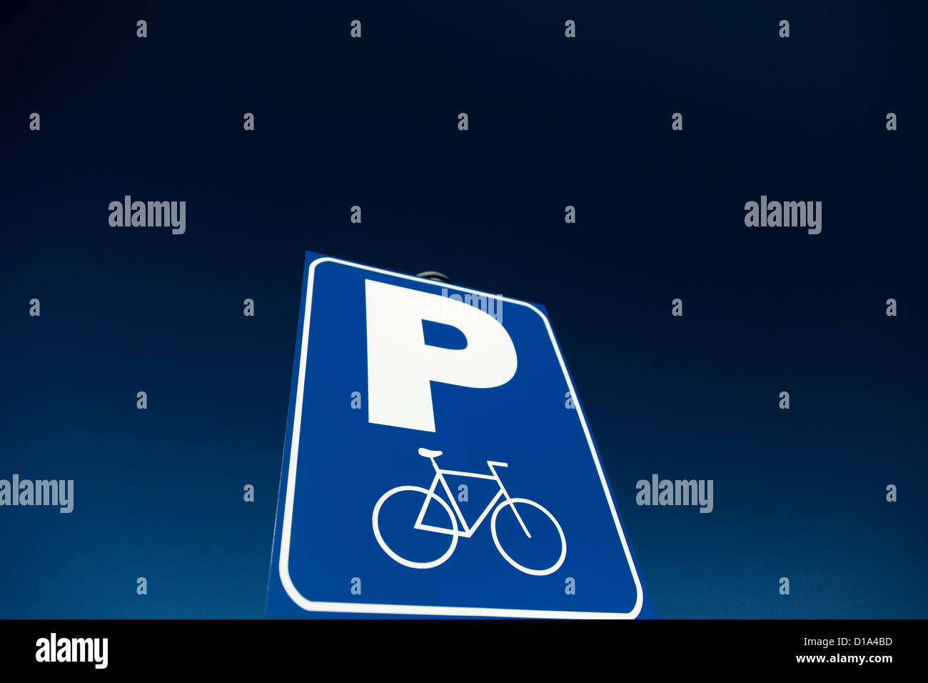 Blue Bicycle Parking Sign Stock Photo - Alamy