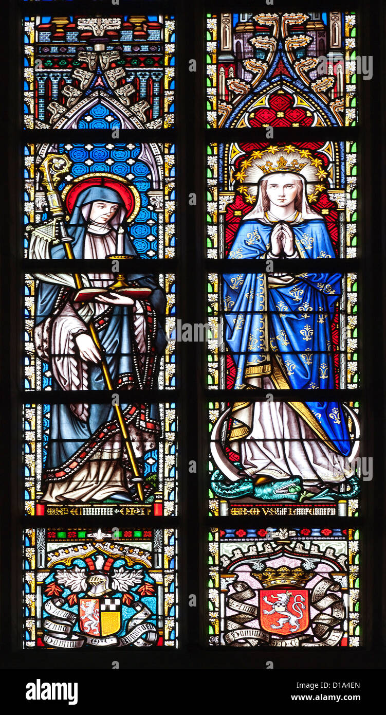 BRUSSELS - JUNE 22: Virgin Mary and saints from windowpane in gothic ...