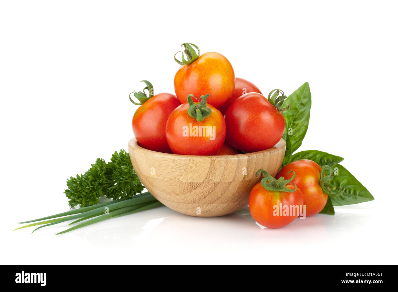 Ripe tomatoes, basil and parsley. Isolated on white background Stock ...